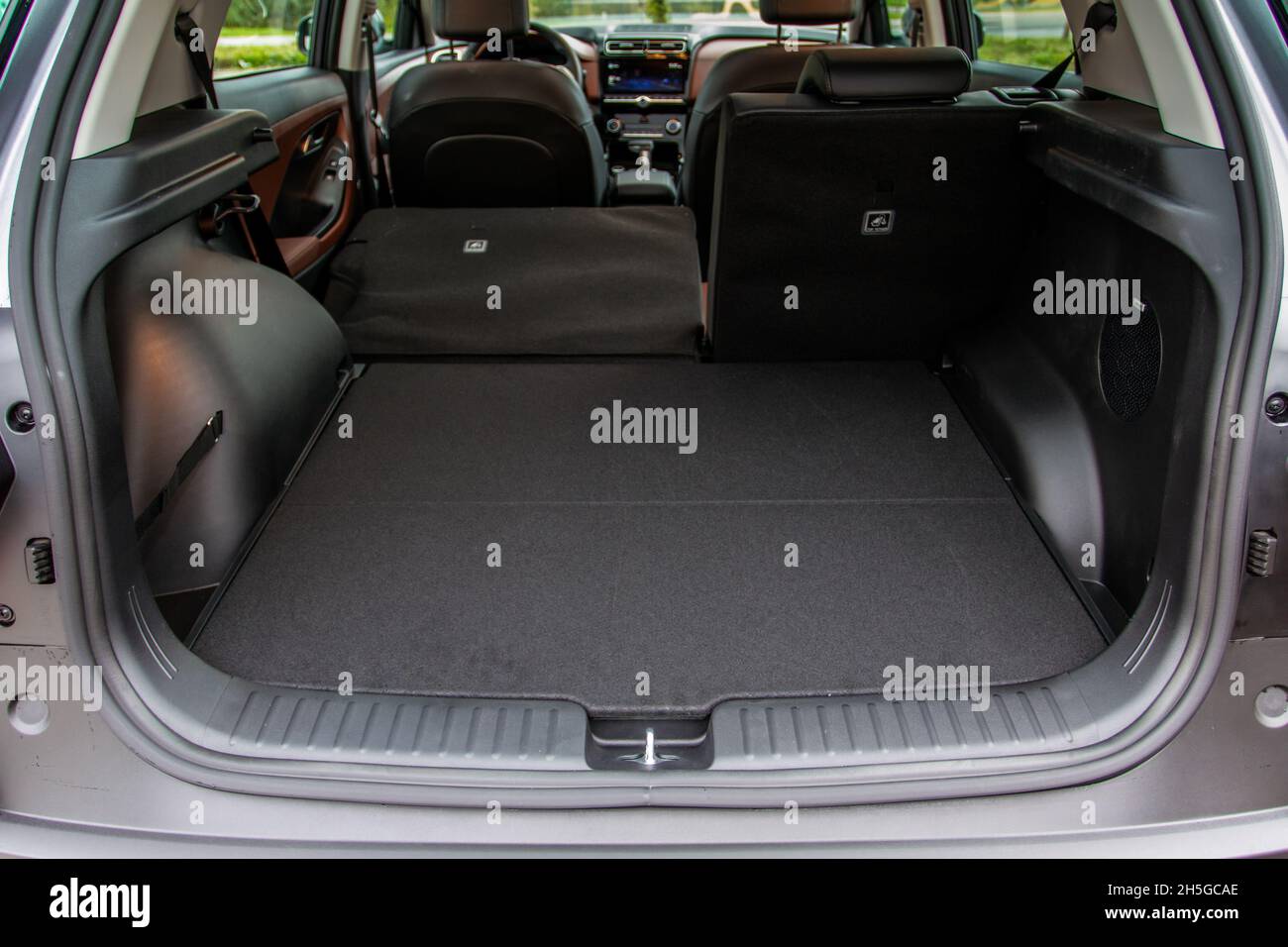 Huge, clean and empty car trunk in interior of compact suv. Rear view ...