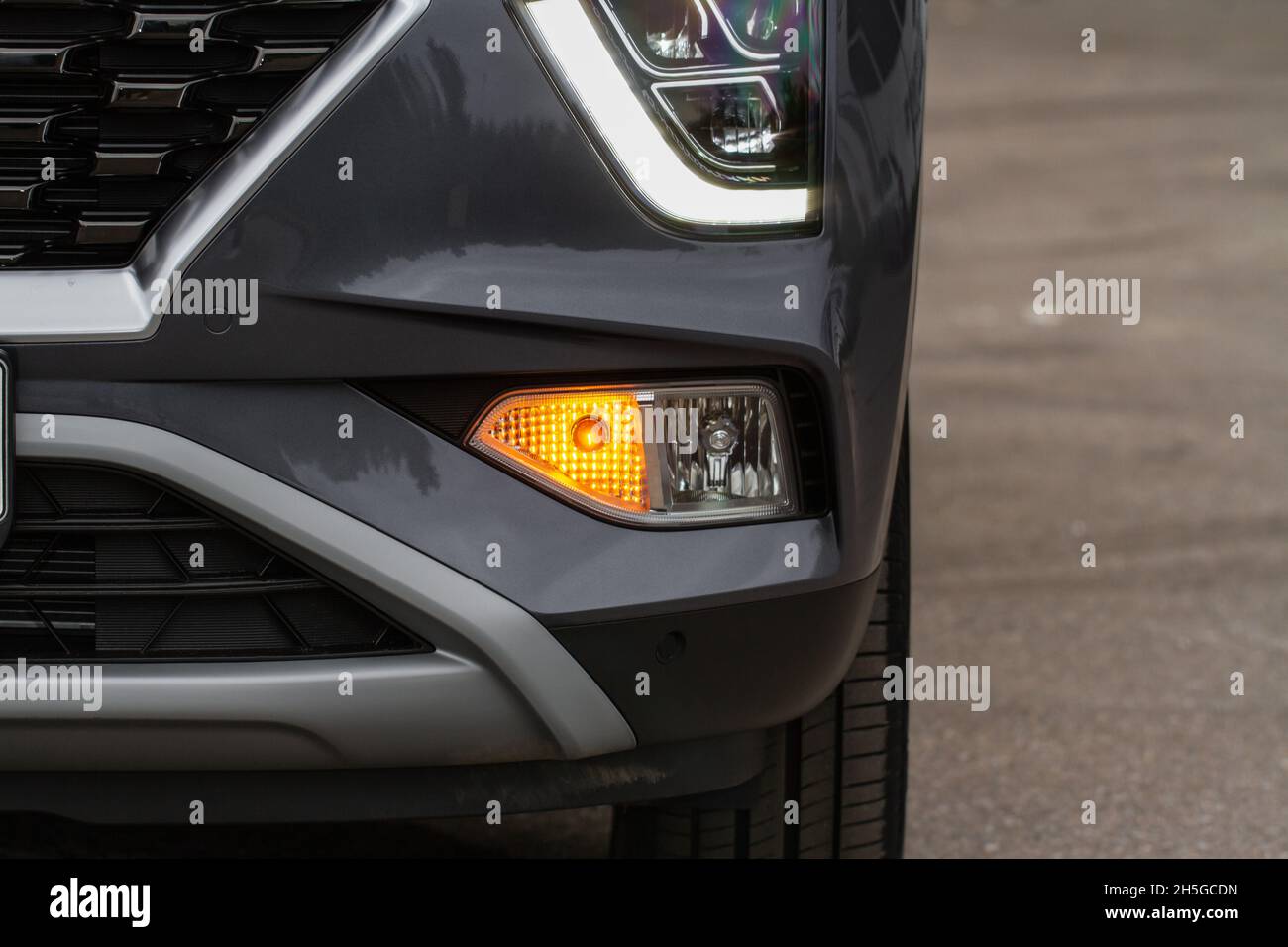 Modern SUV turn signal. Car turn signal close up. Close up of the ...