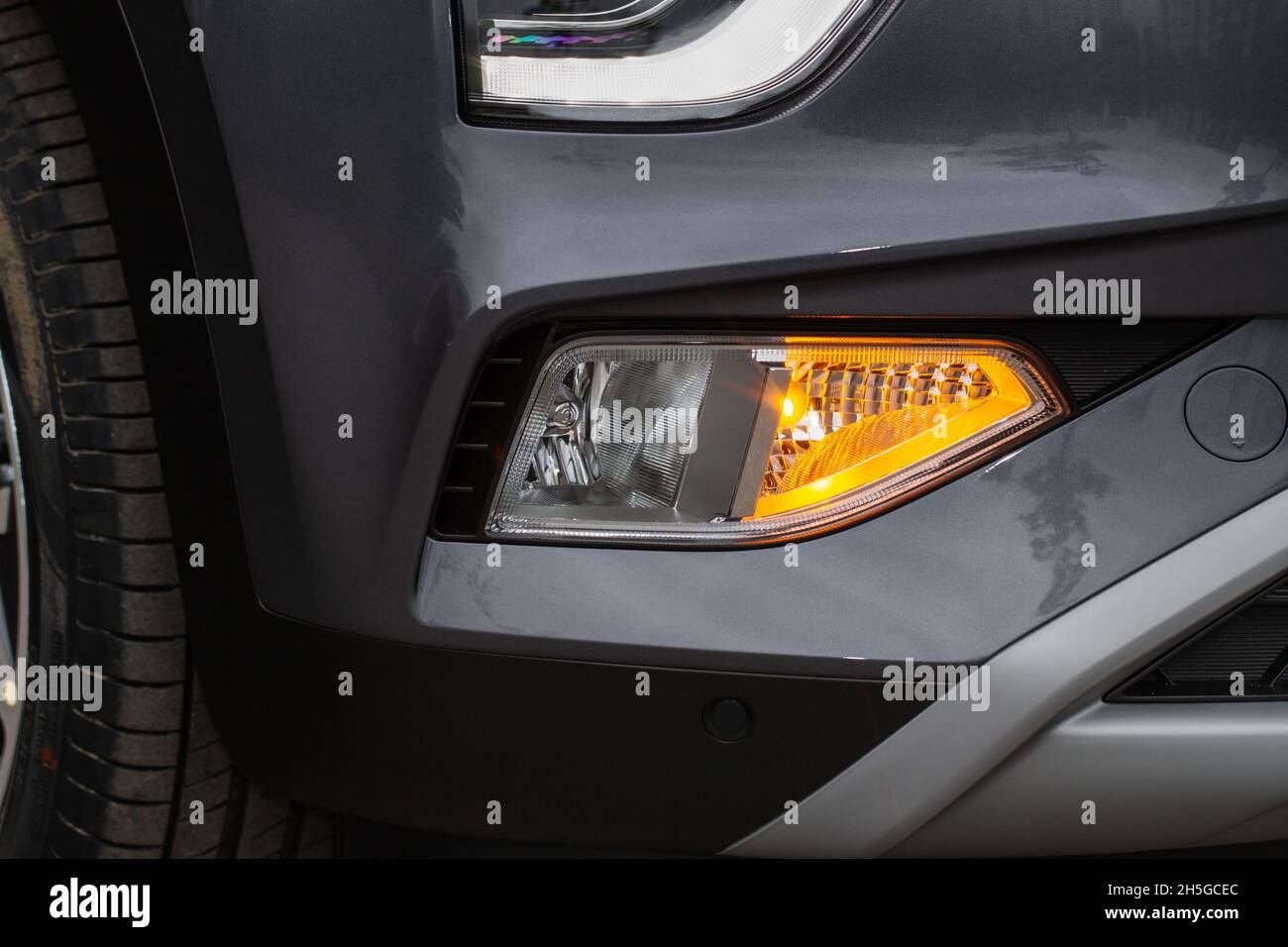 Modern SUV turn signal. Car turn signal close up. Close up of the ...