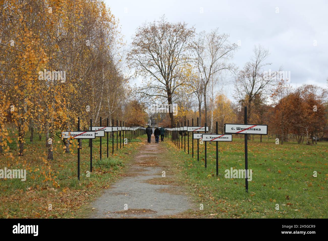 Tourists on a memorial path at the Wormwood Star Memorial Complex in ...