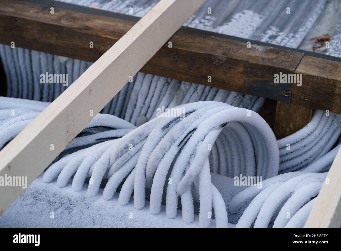 Ice rink cooling system technology : plastic pipes covered with ice for ...