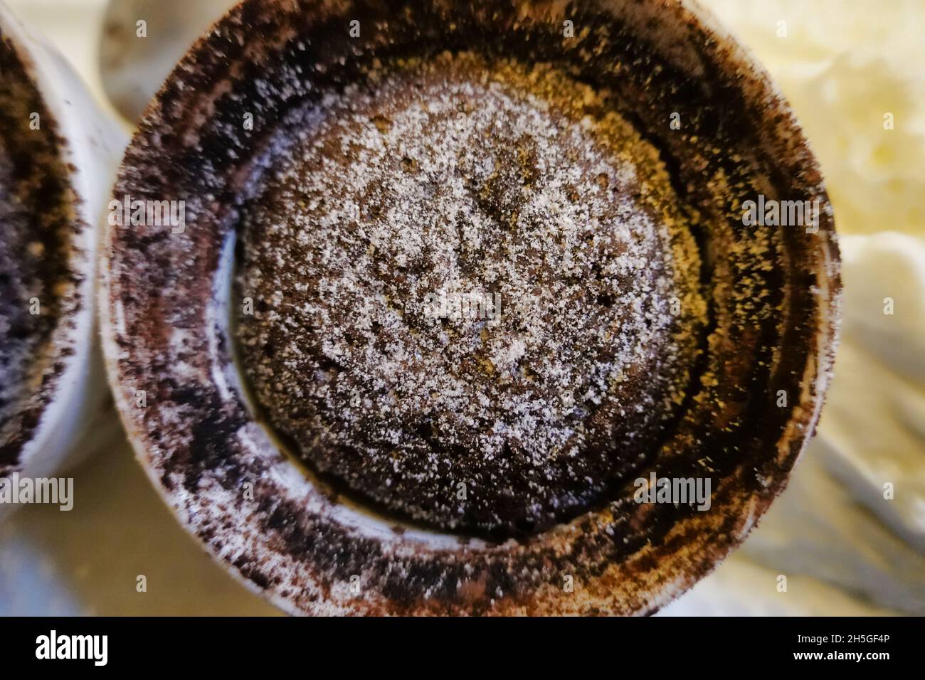 Top view of a chocolate cake in the white cup Stock Photo - Alamy