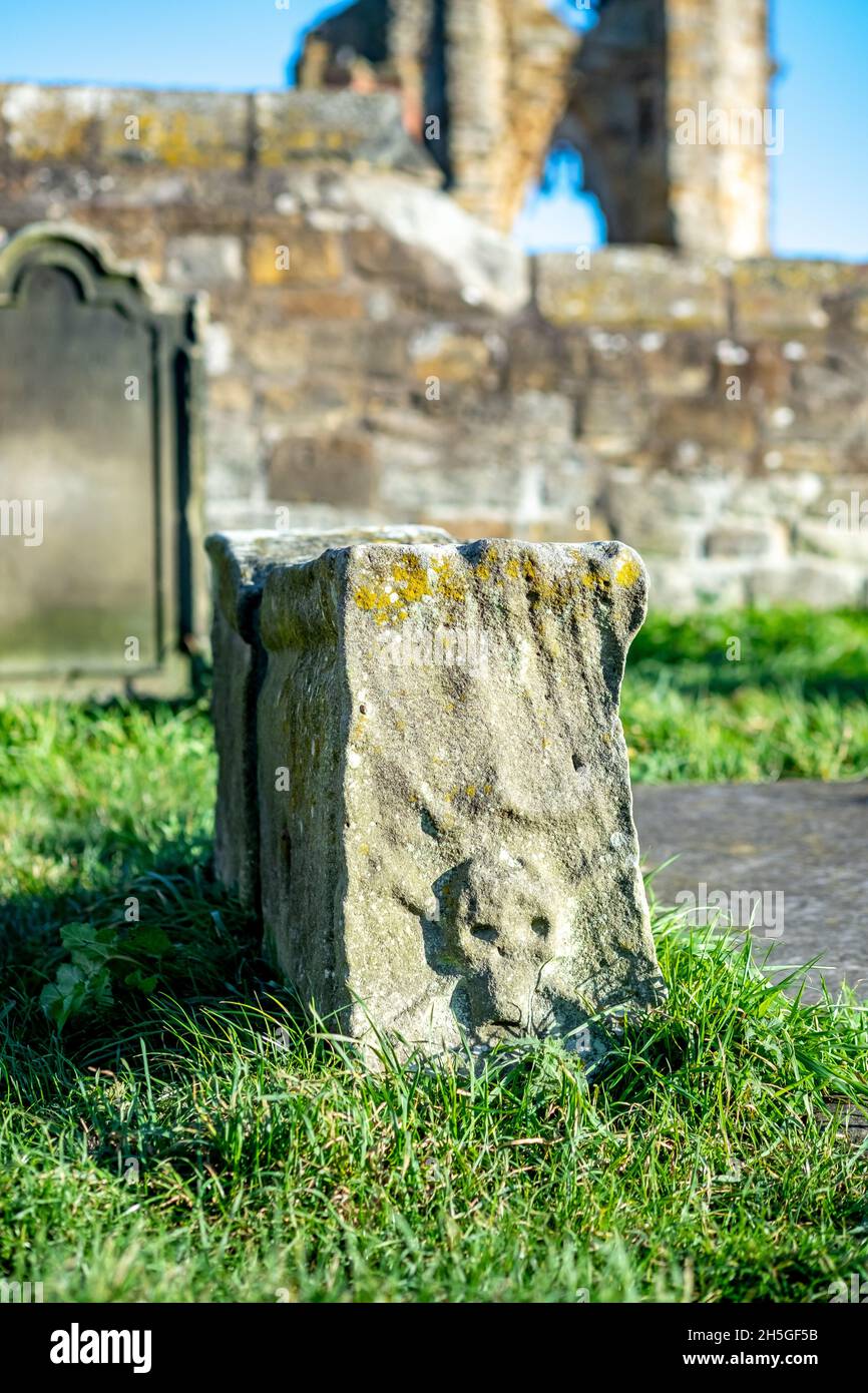 Headstone with a carving of a Jolly Roger or skull and crossbones ...