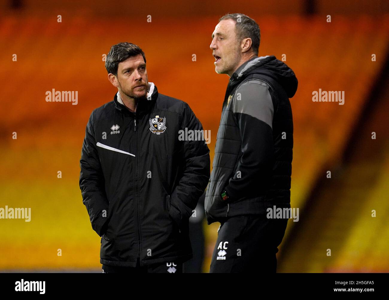 Port Vale manager Darrell Clarke speaks to assistant manager Andy ...