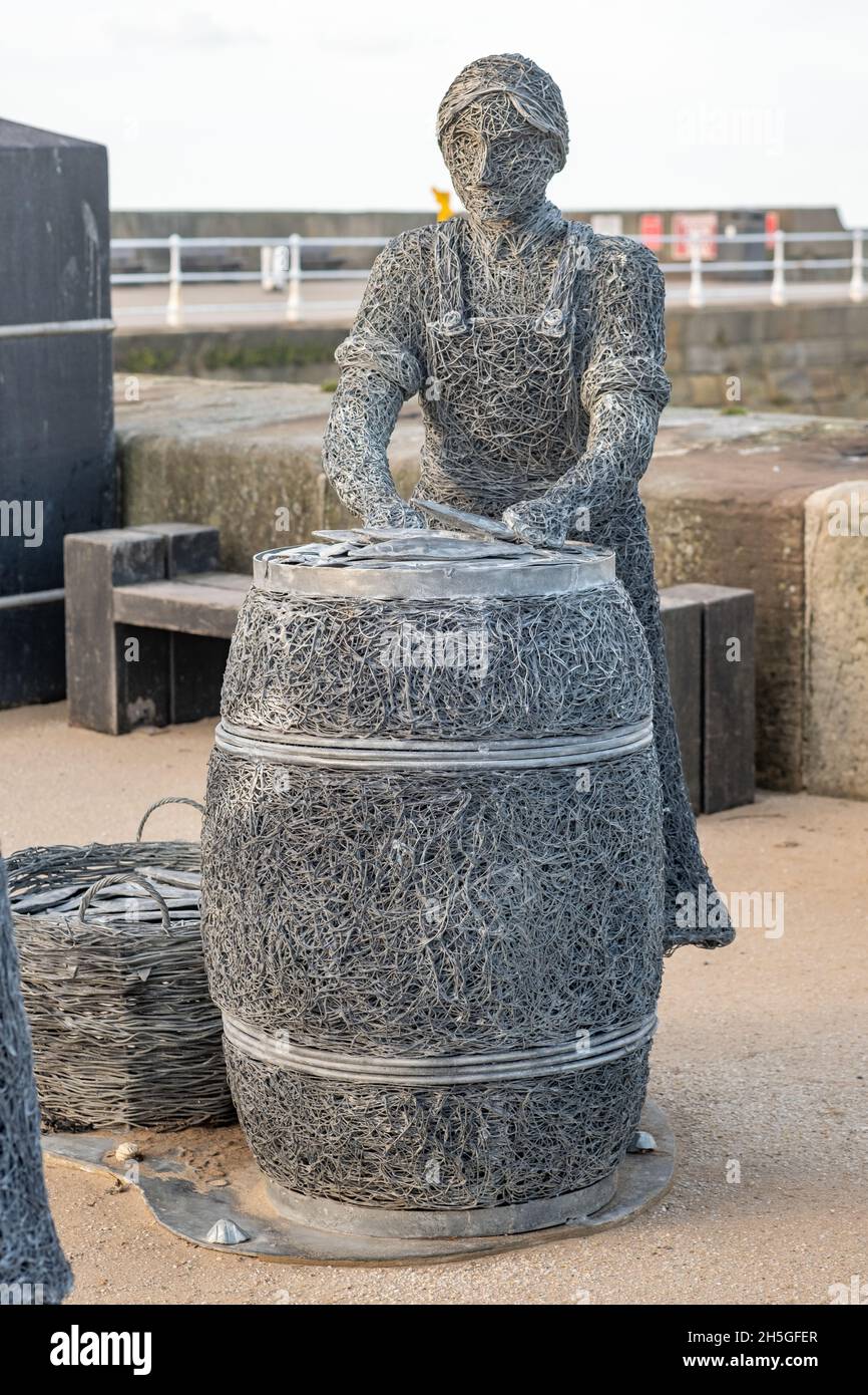 Herring Lasses statue located near the bandstand overlooking Whitby ...