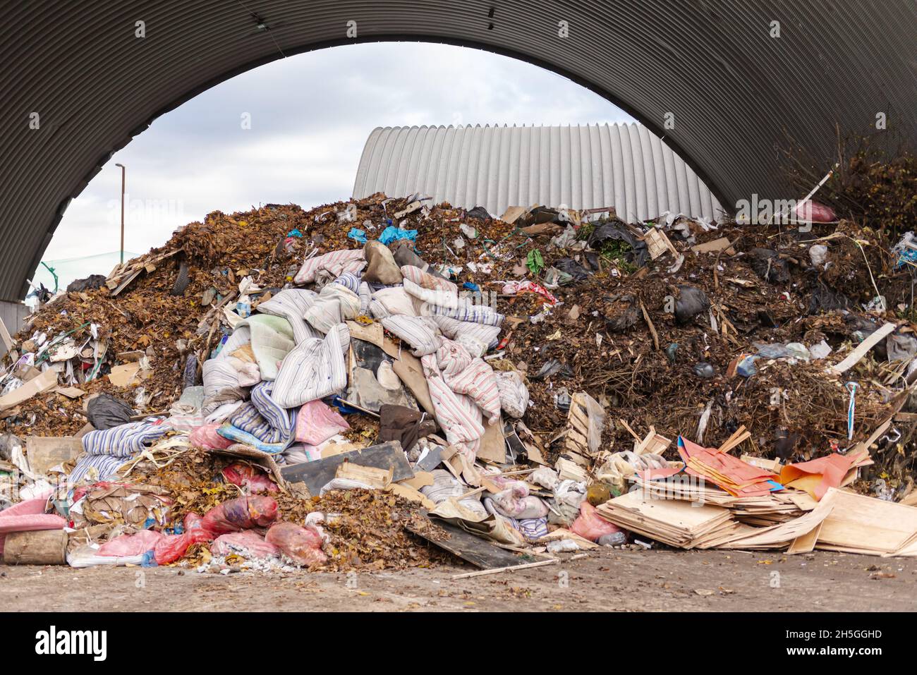 A big pile of garbage. There is a large pile of raw materials and old ...