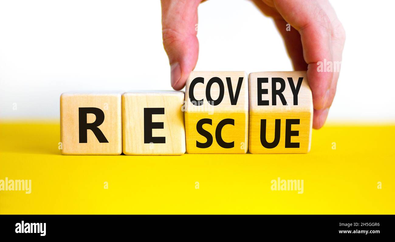 Recovery and rescue symbol. Businessman turns cubes and changes the ...