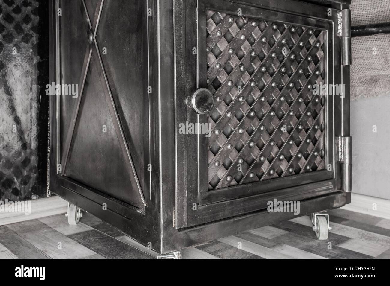 Iron box with a pattern of mesh or metal lattice in the interior of the ...