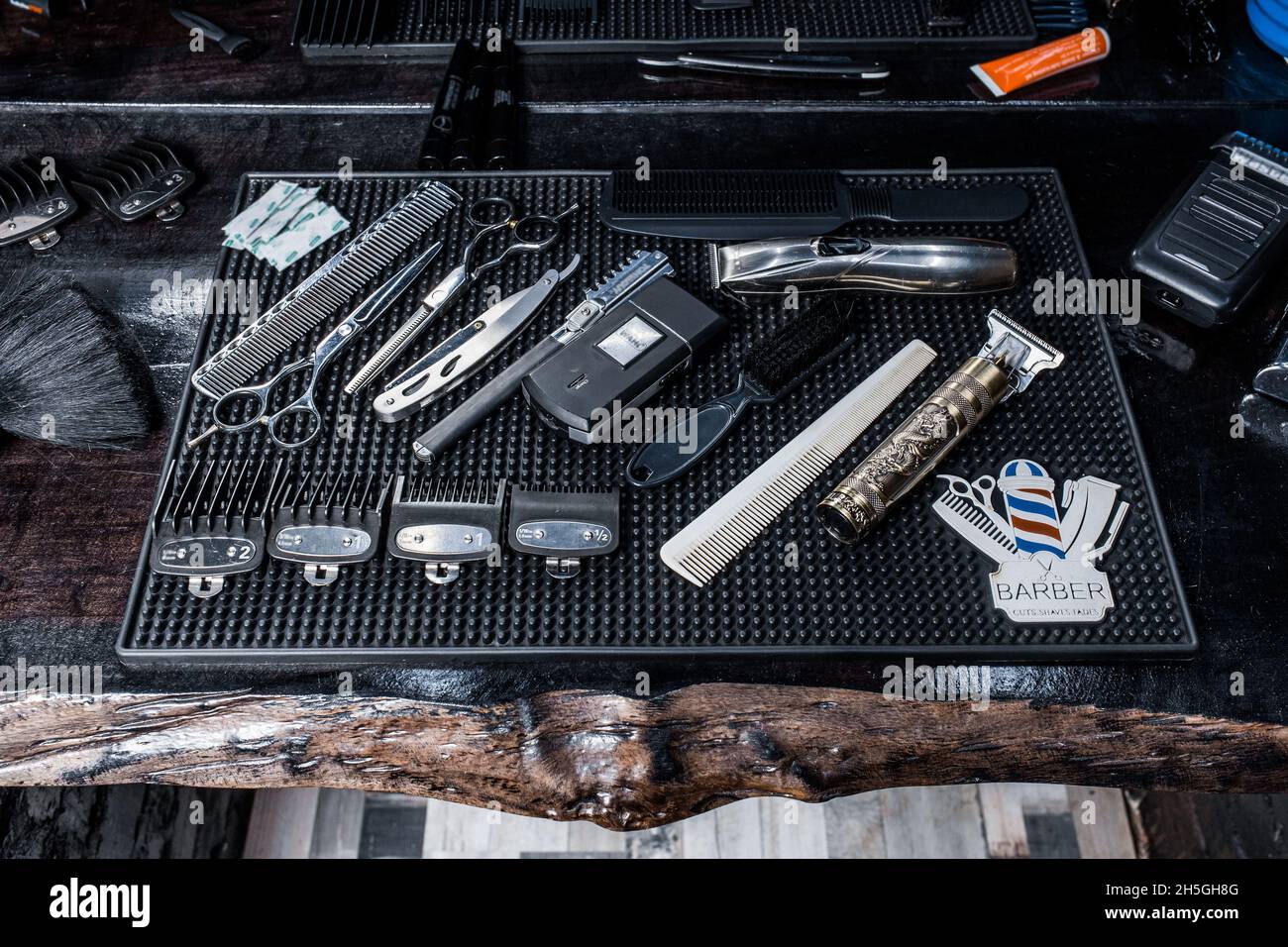 Professional tools and equipment for haircuts and hairstyles in a ...