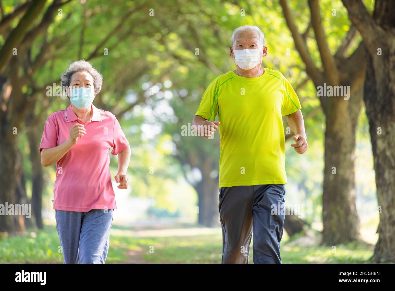 Senior chinese man jogging in hi-res stock photography and images - Alamy