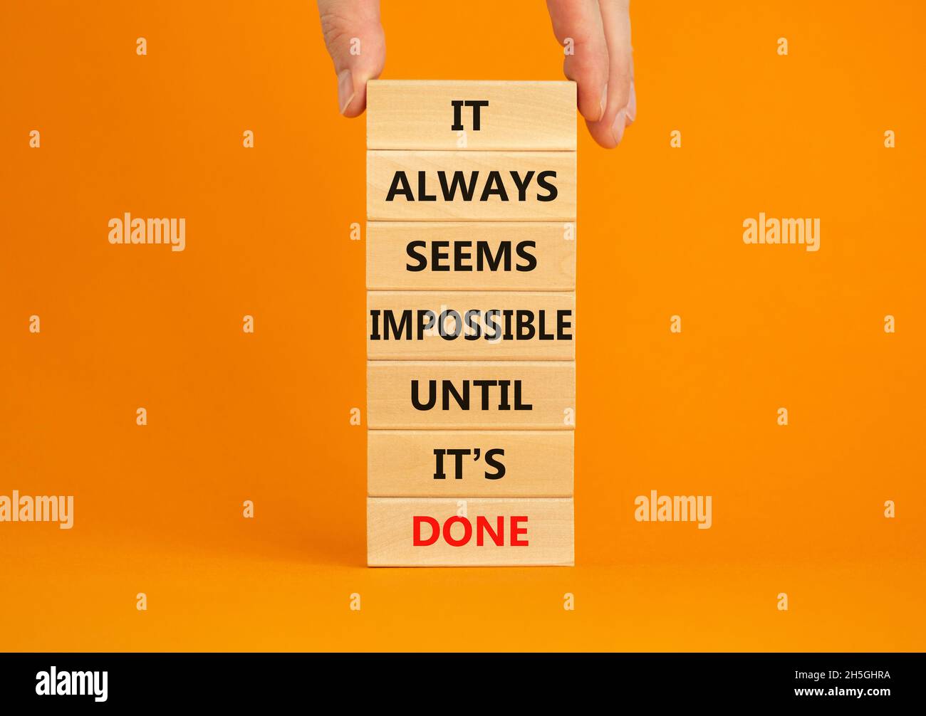 Possible or impossible symbol. Wooden blocks with words It always seems ...