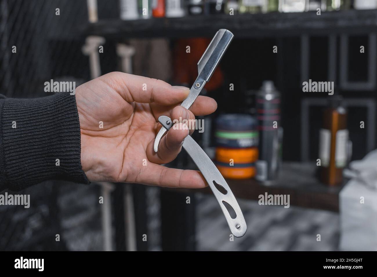 Male hand holds vintage classic hi-res stock photography and images - Alamy