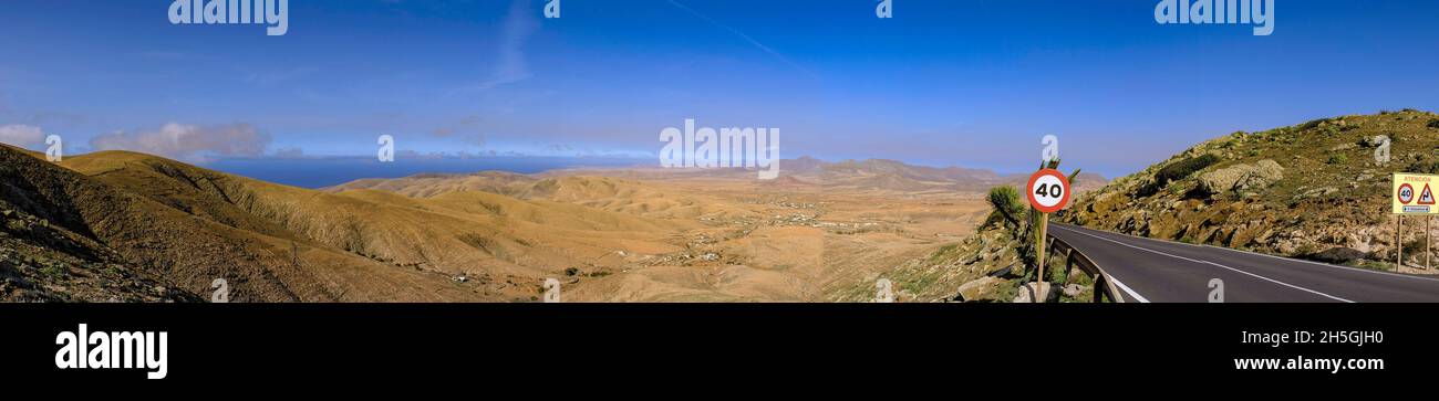 Panoramic landscape with a road surrounded by mountains Stock Photo - Alamy