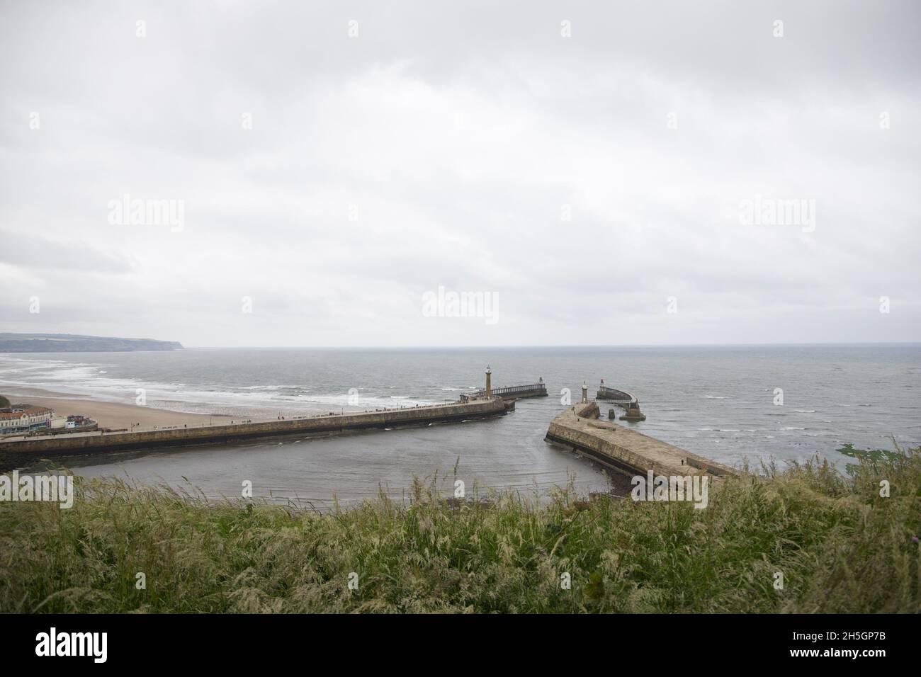 Robin Hood's Bay pier and dock Stock Photo - Alamy