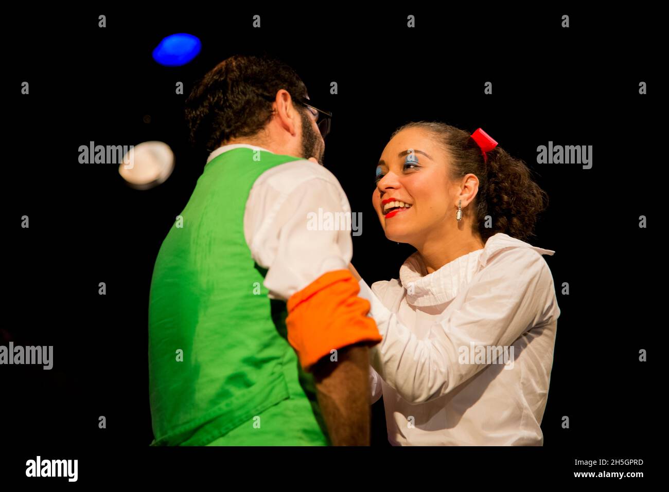 Actor and actress representing a character on stage in a theater. They ...