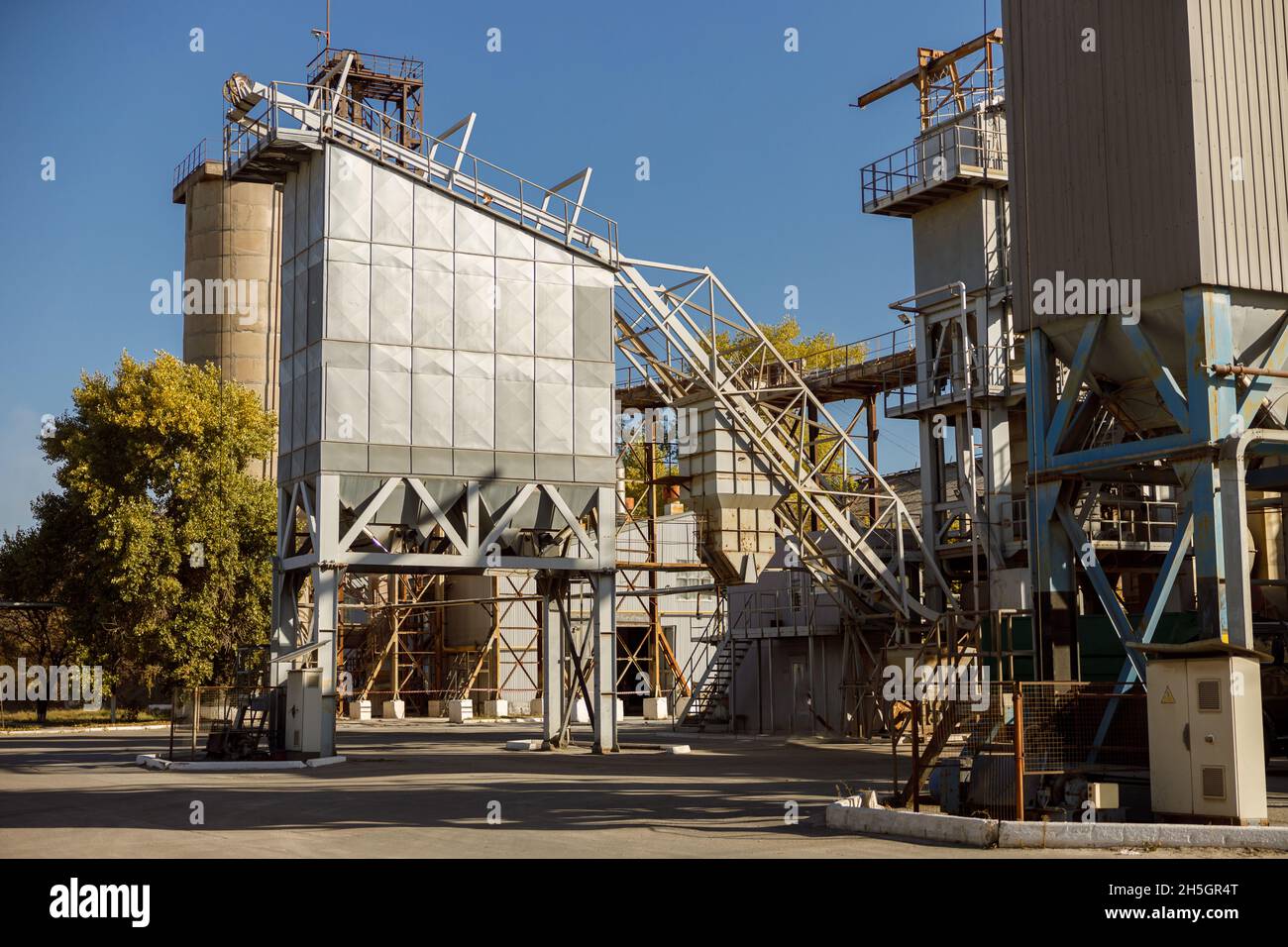 Territory of manufacturing plant with industrial buildings Stock Photo ...