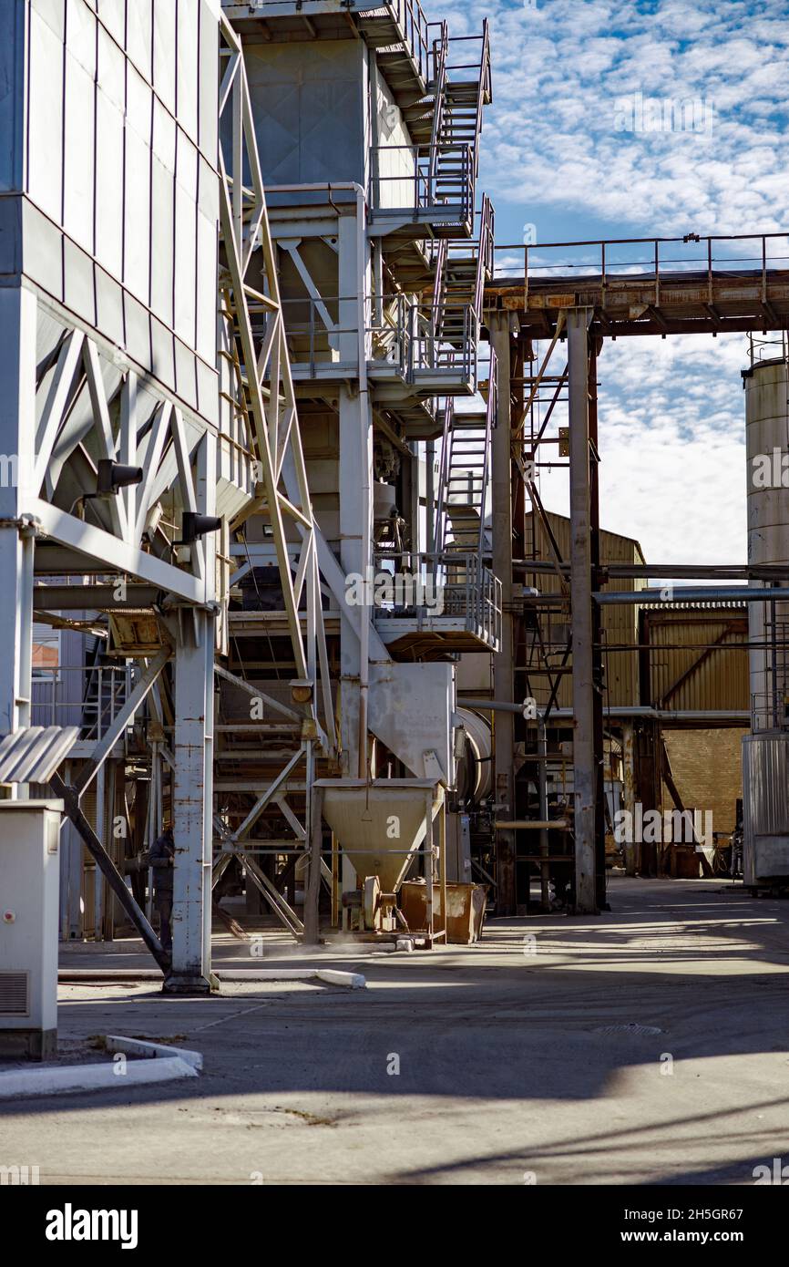 Industrial buildings and ladders at factory outdoors Stock Photo - Alamy