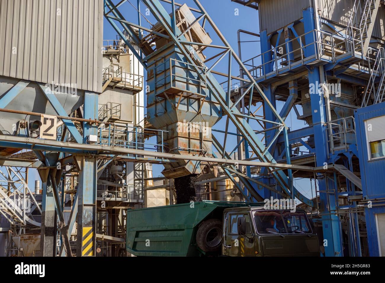 Industrial facilities and truck at production plant Stock Photo - Alamy