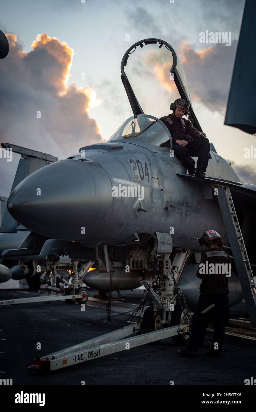 211109-N-RB149-1158 PHILIPPINE SEA (Nov. 9, 2021) Sailors assigned to ...
