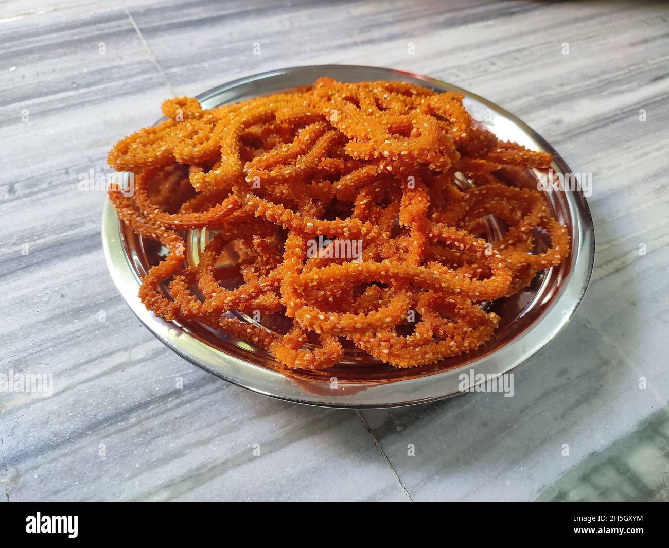 Tomato murukku hi-res stock photography and images - Alamy