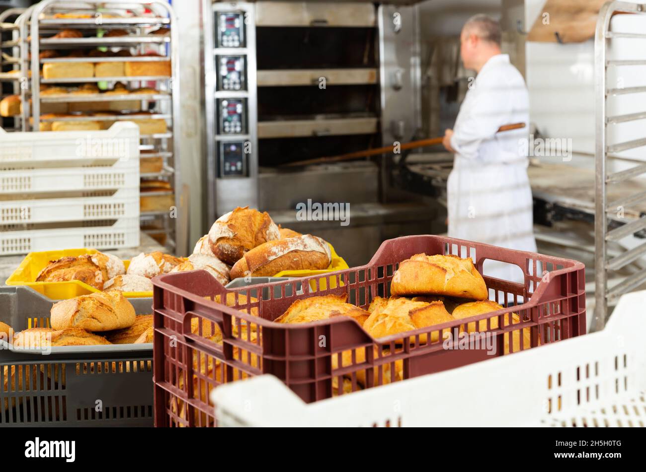 Box full of baked bread in bakeshop Stock Photo - Alamy