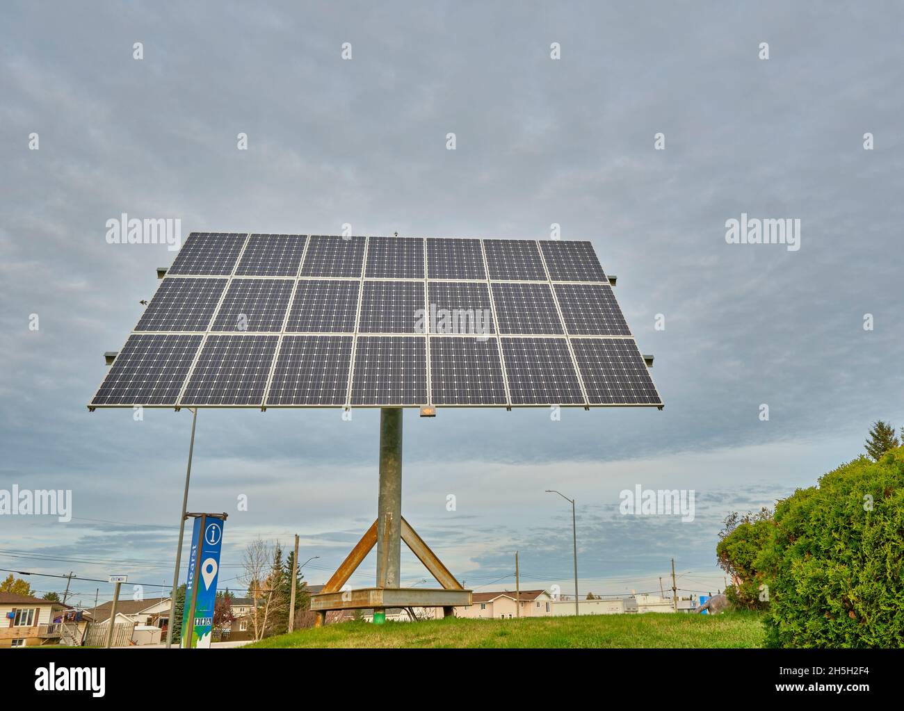 Single solar panel against a moody sky Stock Photo - Alamy