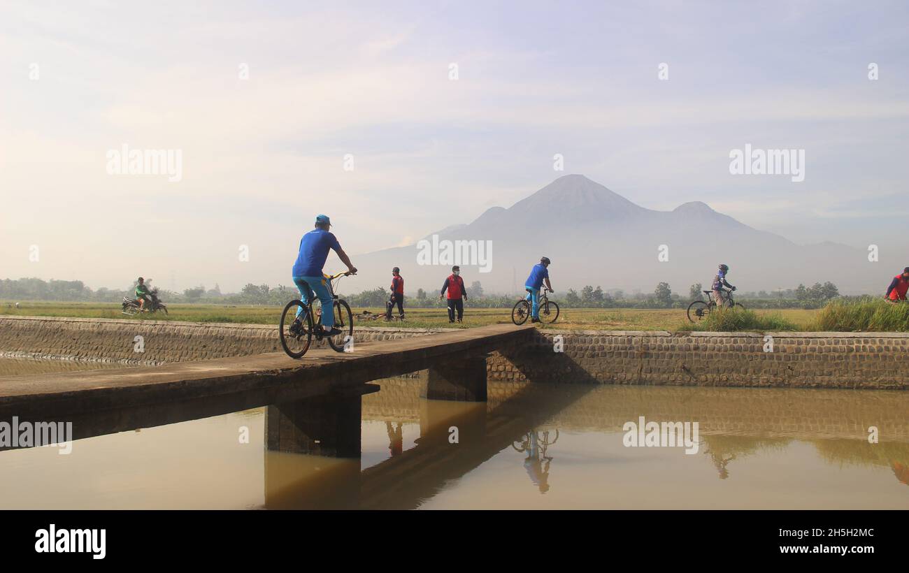 SIDOARJO, INDONESIA - NOVEMBER 06, 2021: The floating bridge (Sutam Bridge) is above the Brantas ...