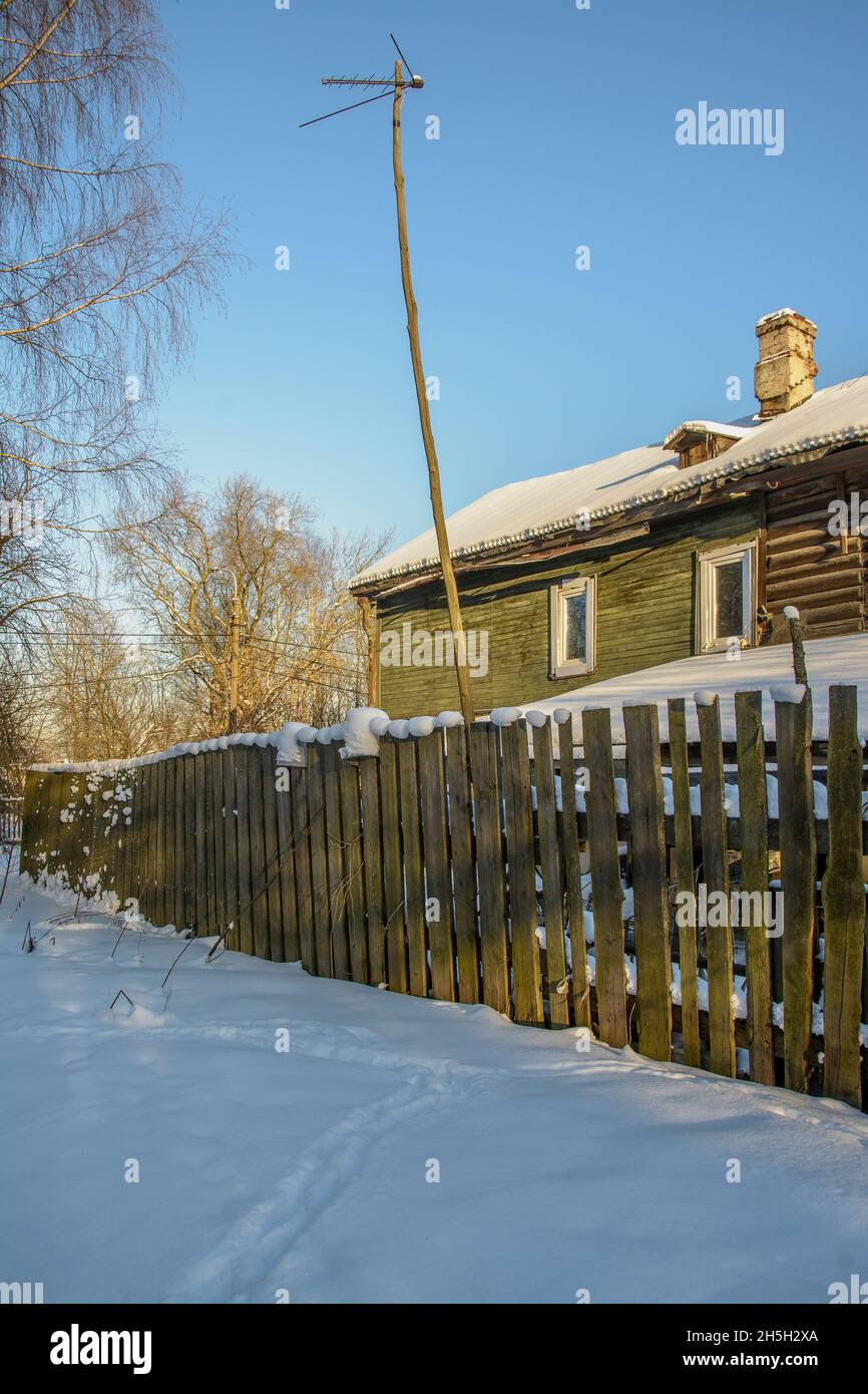 Remains of old wooden houses in the village of Ust-Slavyanka in the area of the construction of ...