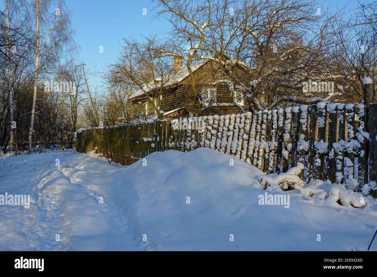 Remains of old wooden houses in the village of Ust-Slavyanka in the area of the construction of ...