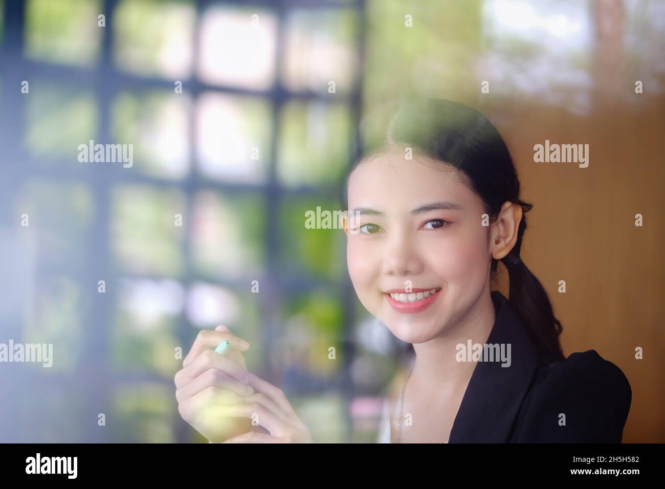 Person smiling into a mirror hi-res stock photography and images - Alamy