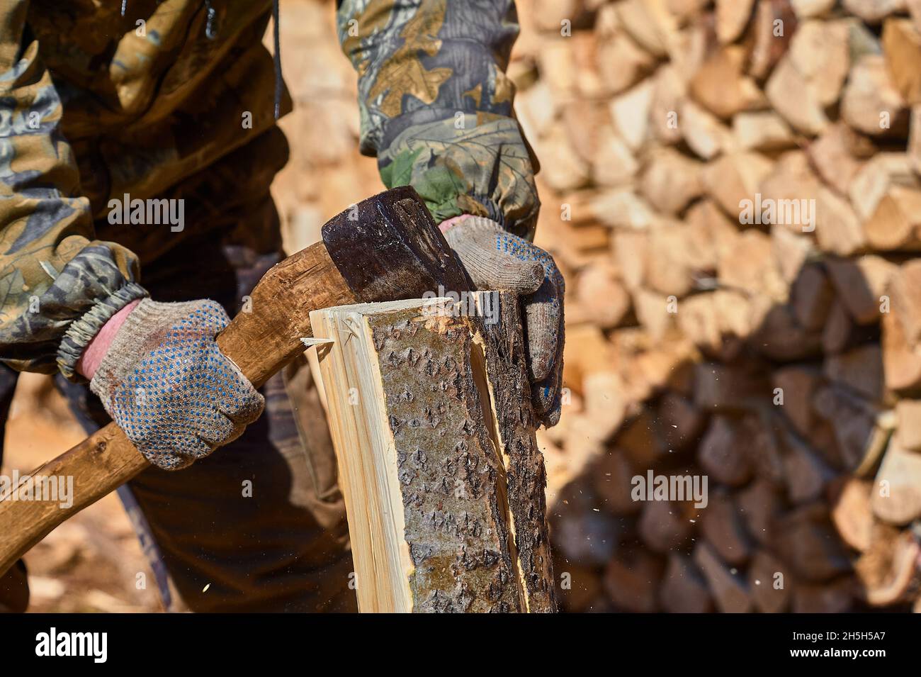 chopping firewood with an axe close-up Stock Photo - Alamy