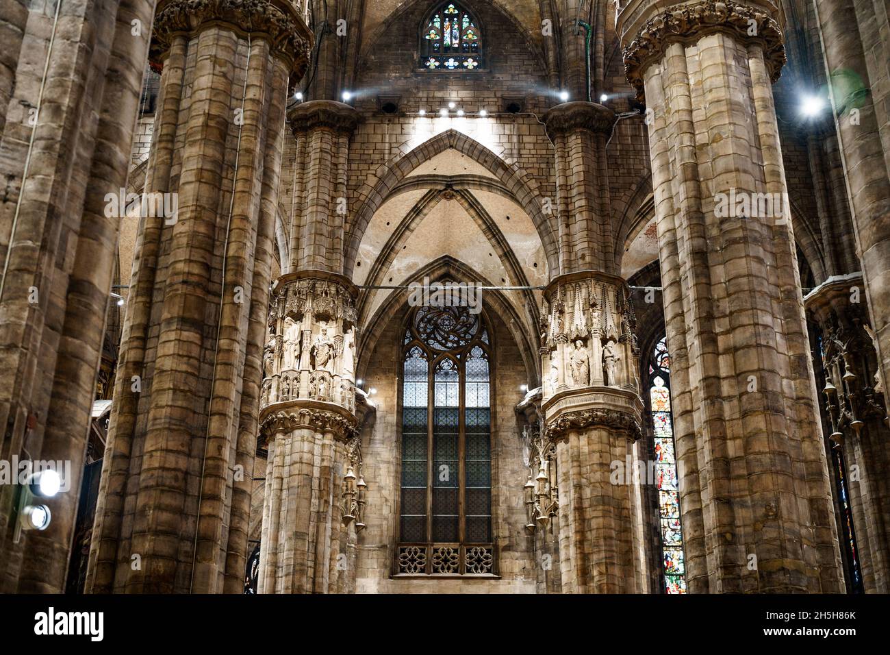Tall arched stained glass windows in the Duomo. Italy, Milan Stock ...