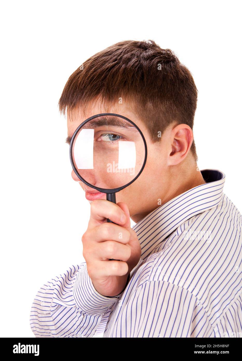 Man magnifying glass on eye hi-res stock photography and images - Alamy