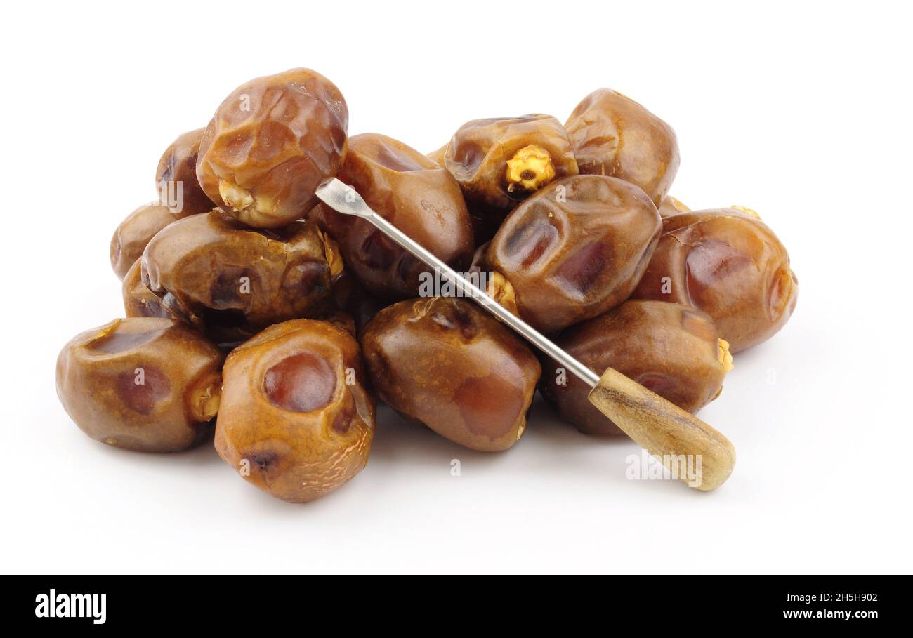 Group of ripe soft and sticky Zamli dates fruit, Zamli dates have a ...
