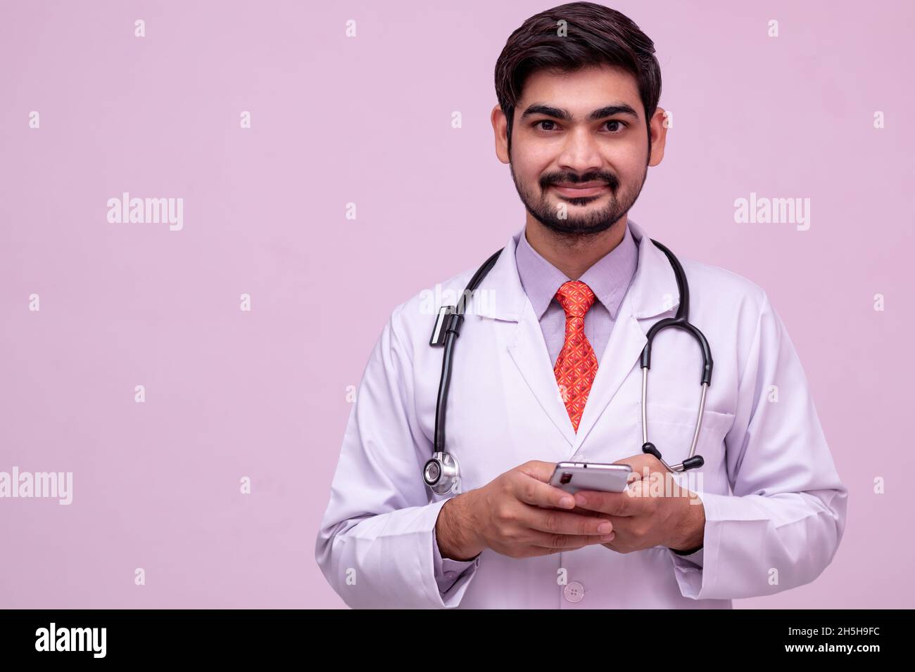 Portrait cheerful male doctor smiling hi-res stock photography and ...