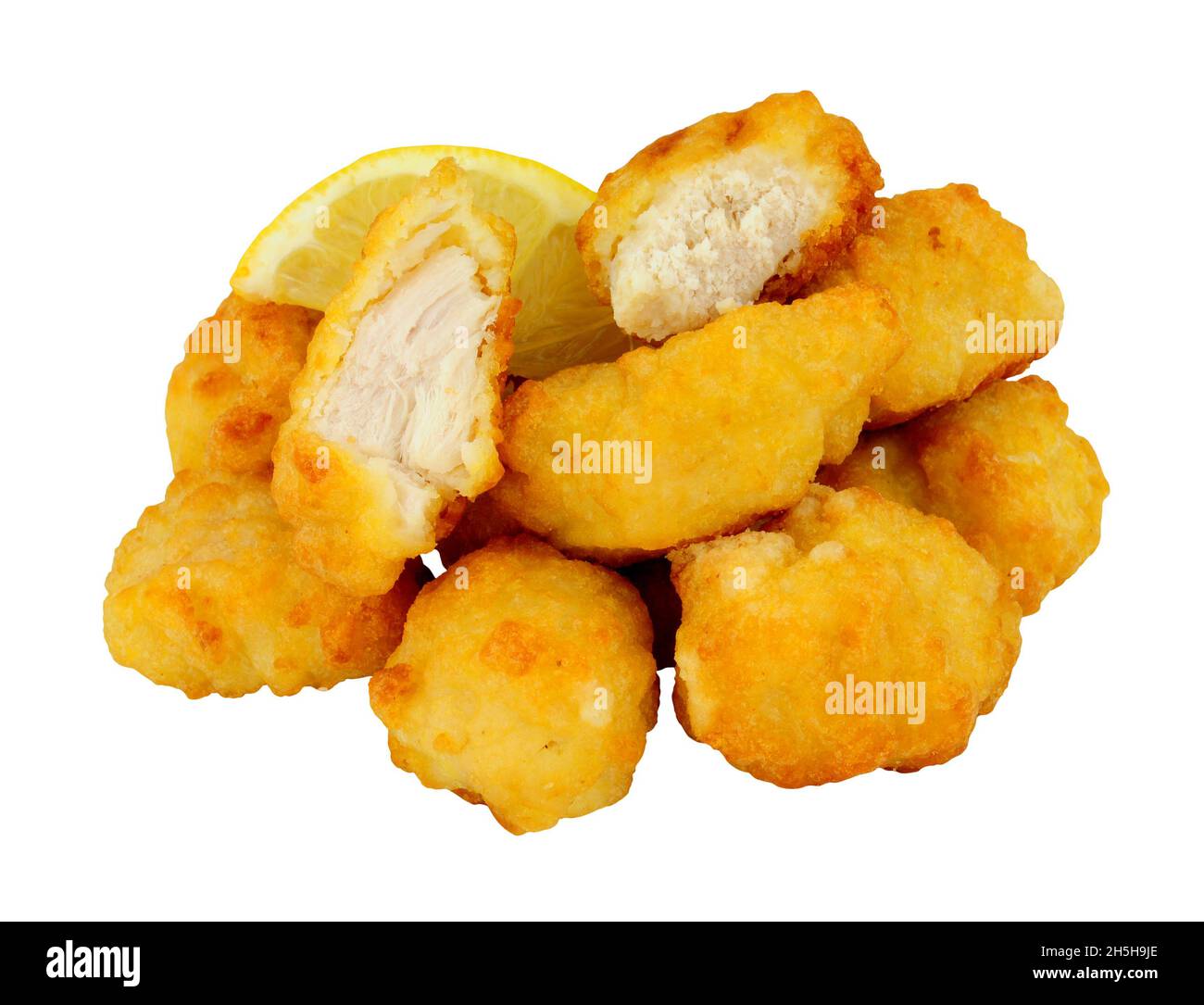 Group of tempura battered chicken nuggets isolated on a white ...