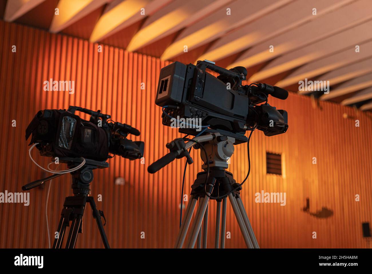Two video cameras for a live stream or video production at a fancy gala ...
