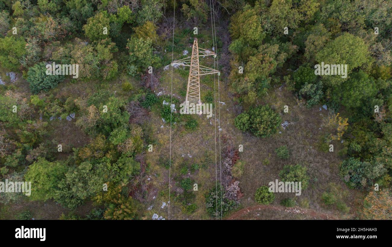 Vkew of metal electrical pylon in karst style greenery in Croatia Stock ...