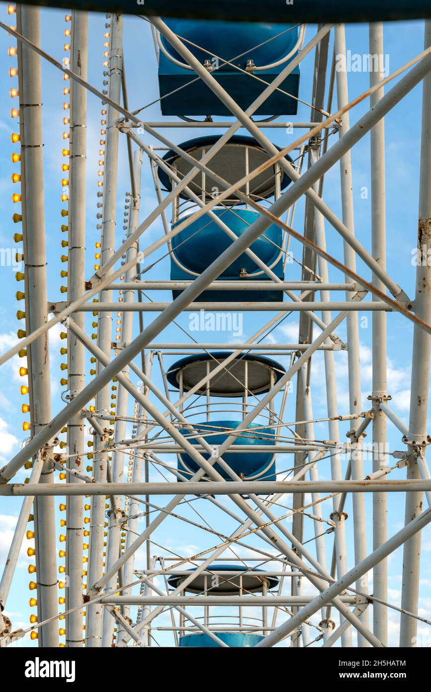 View of Inside of Ferris Wheel view of the structure with cabins. The ...