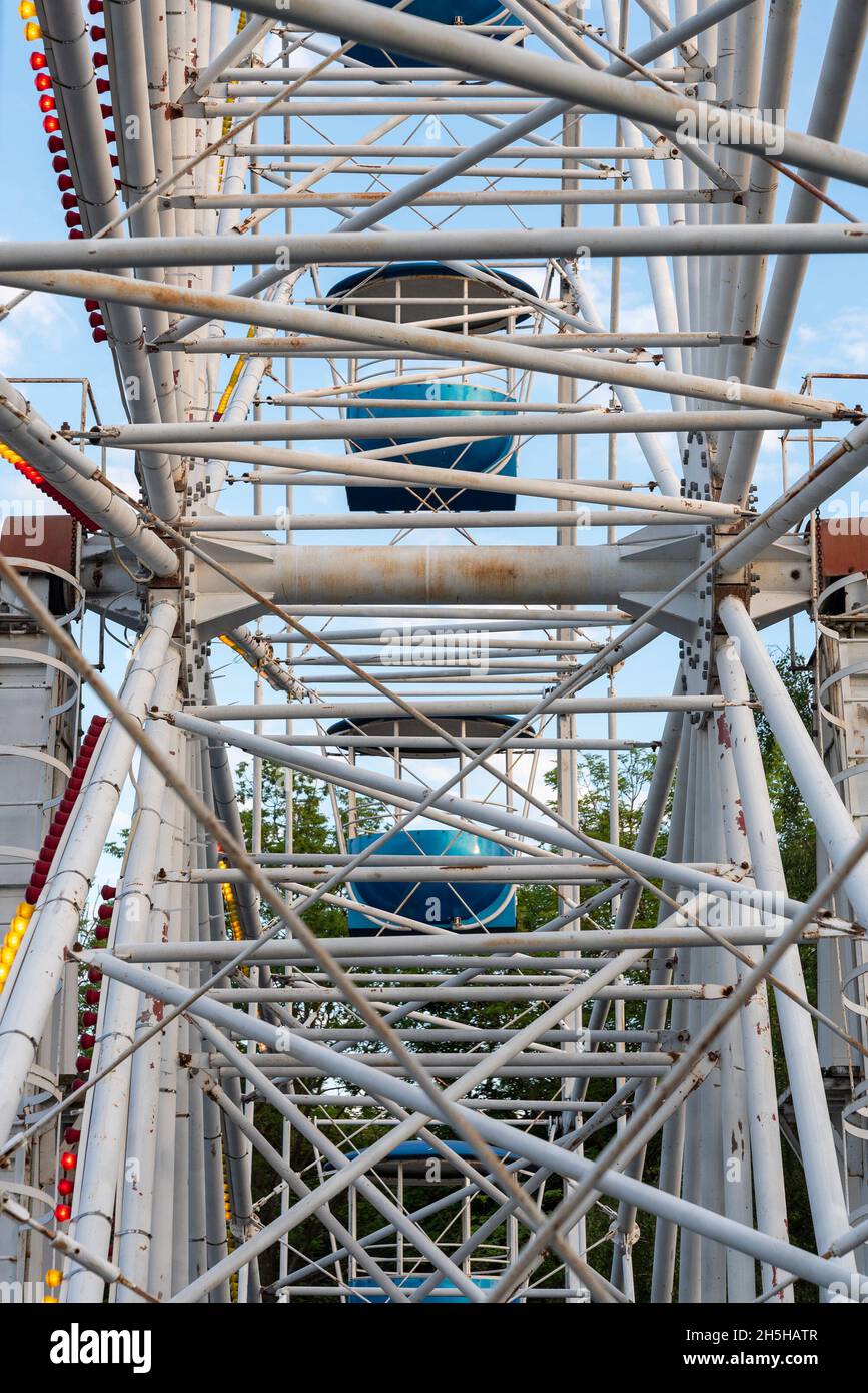 View of Inside of Ferris Wheel view of the structure with cabins. The ...