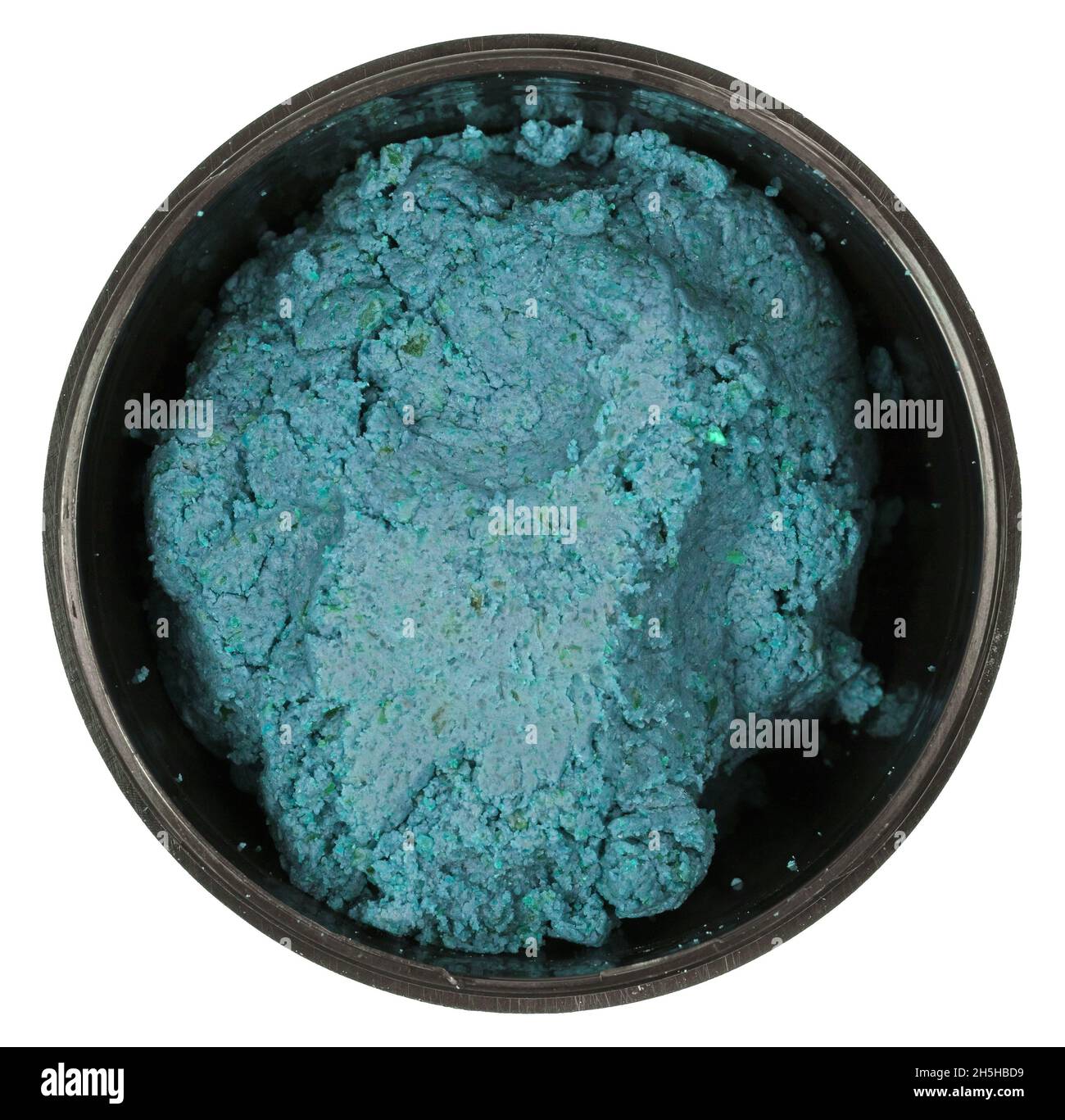 Special blue body scrub in black cup, isolated on white background ...