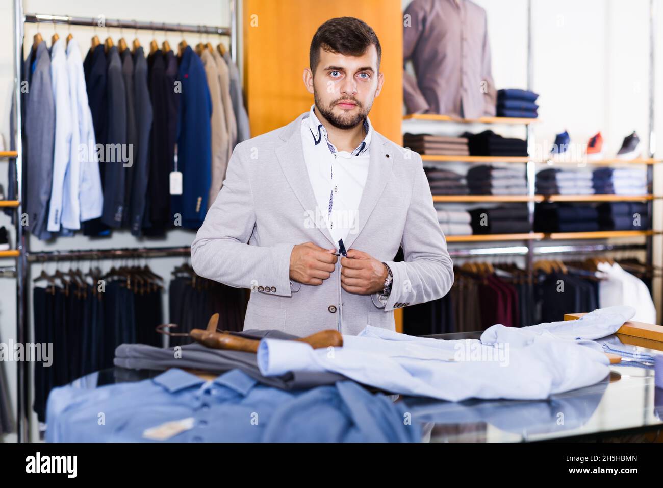 Male shop assistant suit jacket hi-res stock photography and images - Alamy