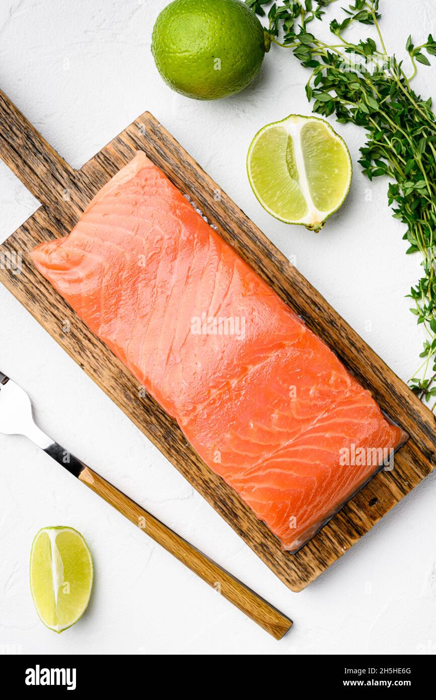 Salmon fillet fish set, with herbs, on white stone table background ...