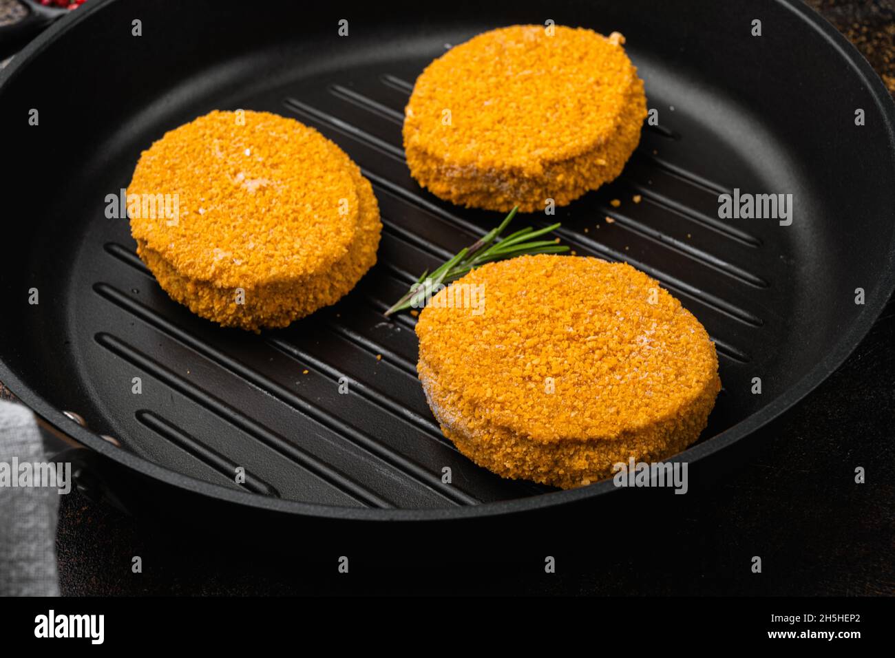 Breaded fish patties set, on old dark rustic table background Stock ...
