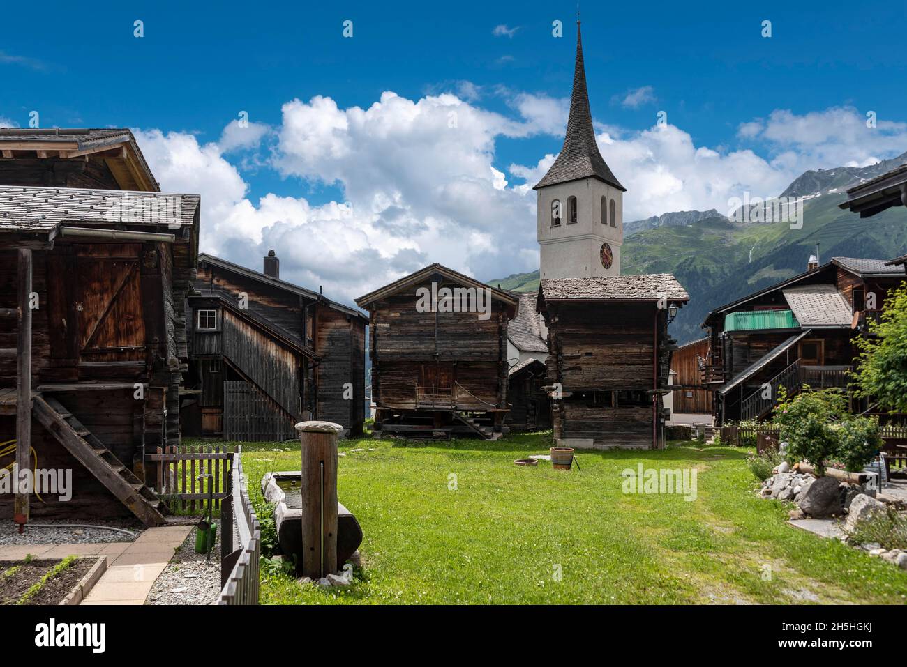 Historic village centre with wooden Valais houses and tower of the ...