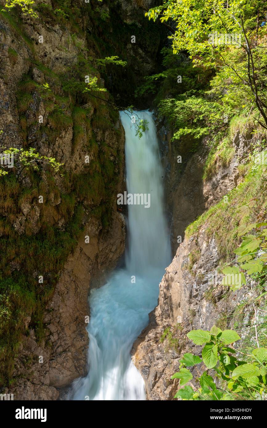 Mountain stream with waterfall, flowing through a narrow gorge, gorge ...