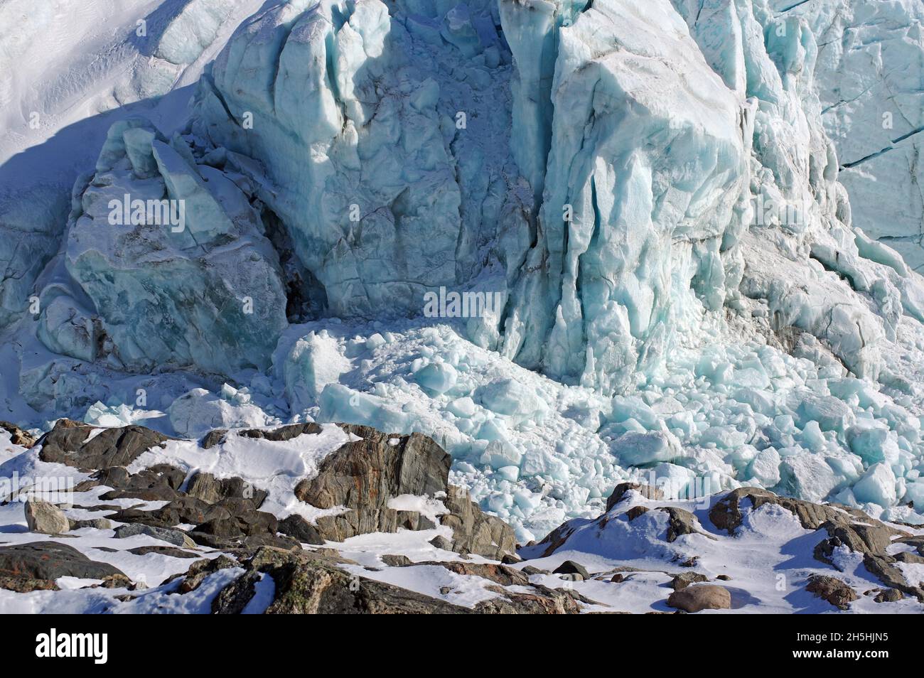 Large ice front of a glacier with crevasses and cracks, Russel Glacier ...