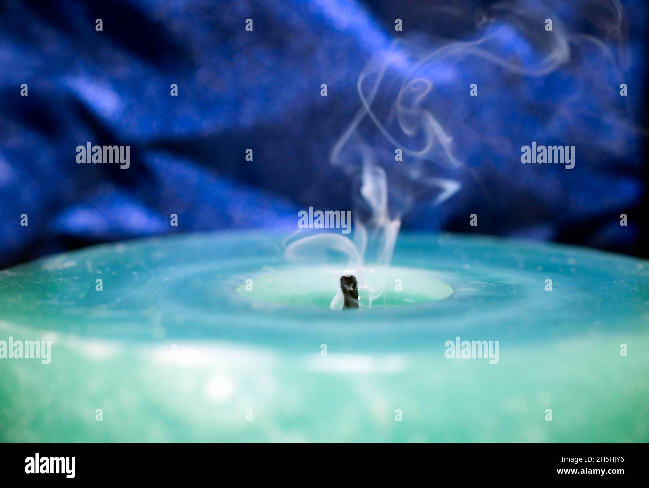 Still smoking candle wick Stock Photo - Alamy