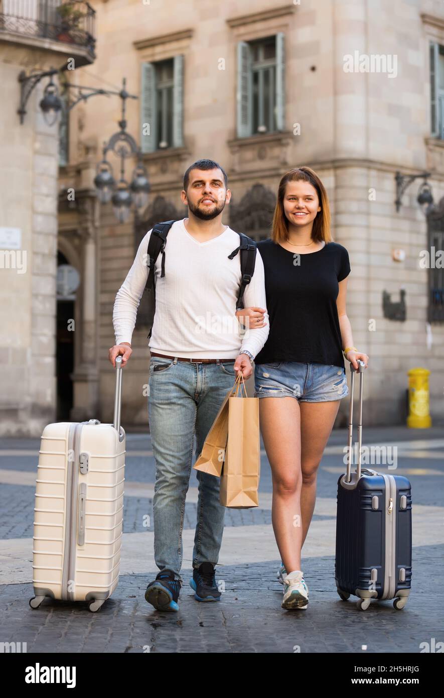 Young positive family couple hi-res stock photography and images - Alamy