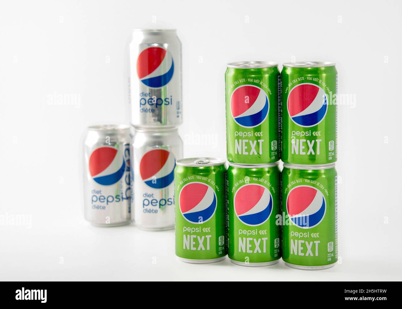 Small cans of Pepsi-Cola Next and Diet by PepsiCo.Nov. 9, 2021 Stock ...